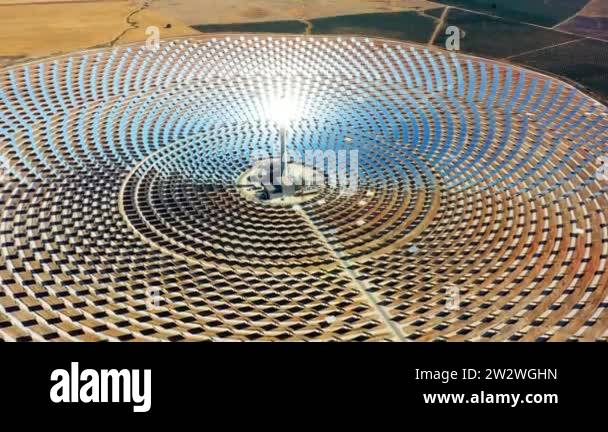 Modern solar power station with tower in aerial view, Concentrated solar power tower, solar farm ...