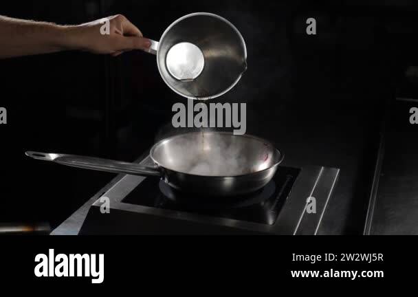 Fire Flames Igniting And Burning on black background while cooking ...