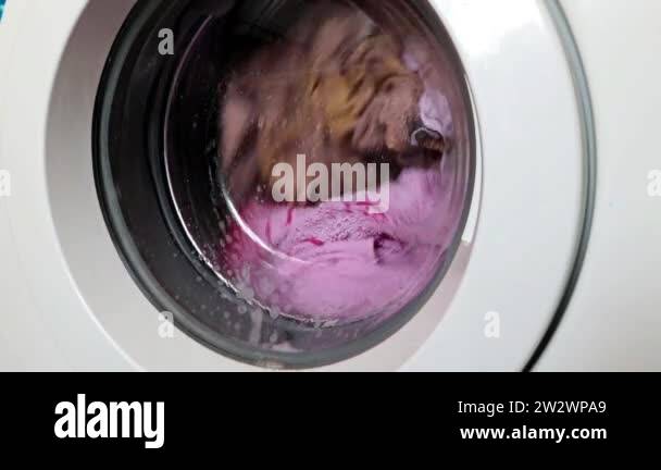 rotation of the washing machine drum while washing clothes Stock Video ...