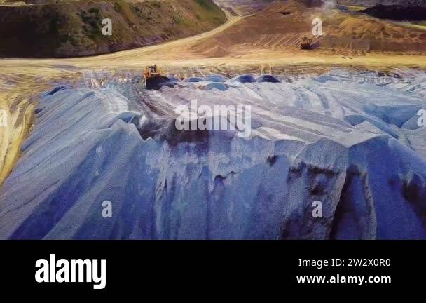 Excavation works for extraction of crushed stone. Stock footage. Top ...