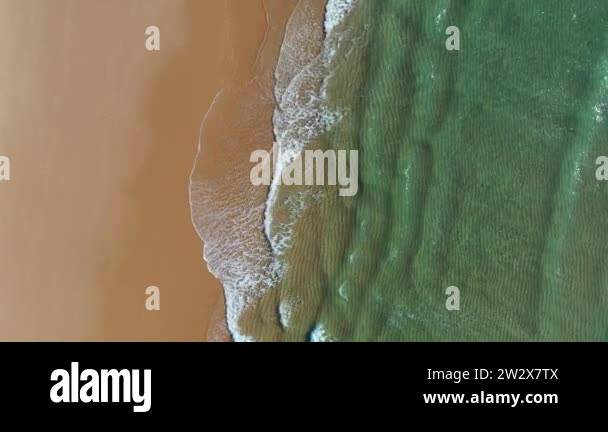 Tropical beach aerial view, Top view of waves break on tropical yellow ...