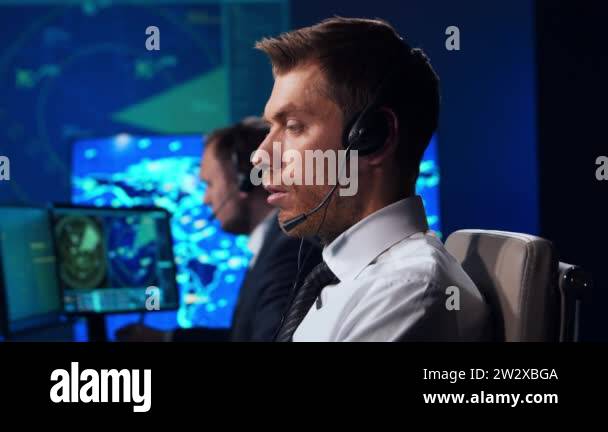 Workplace of the air traffic controllers in the control tower. Team of ...