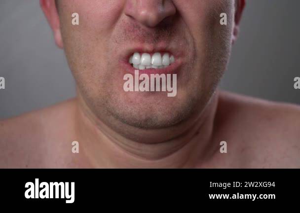 Zoom effect. Man with angry facial expression is screaming out loud ...