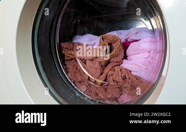 rotation of the Laundry drum of an industrial automatic washing machine ...
