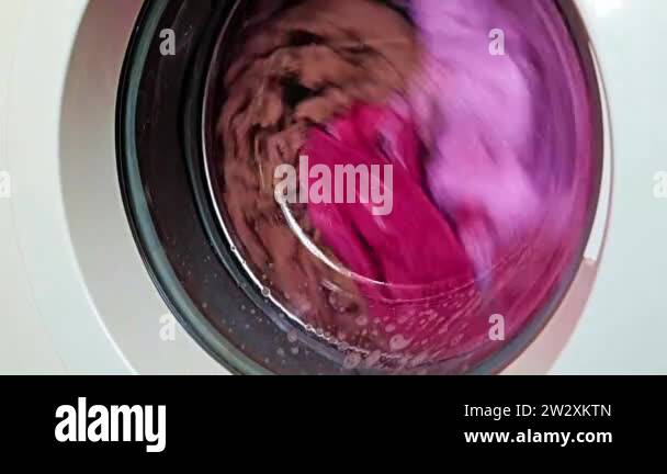 rotation of the Laundry drum of an industrial automatic washing machine ...