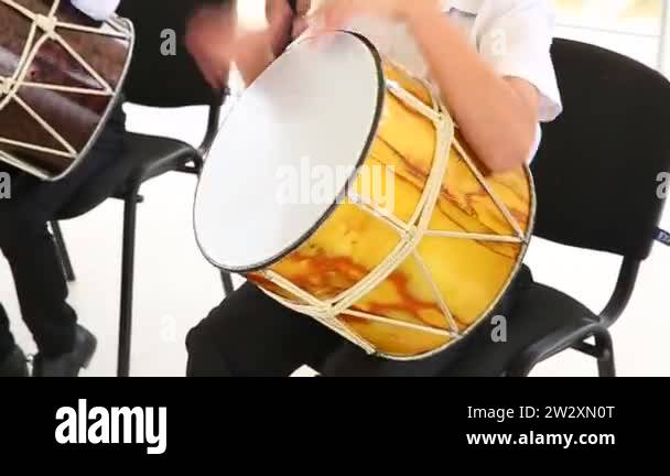 Young azeri guys playing traditional drum nagara on the holiday of ...