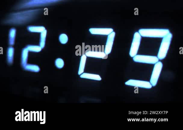 4K Digital Clock Turn to 12 30 Futuristic Design 1 Stock Video Footage ...