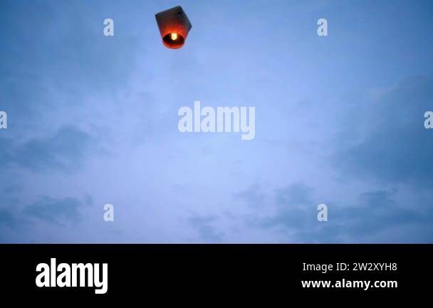 4K Asian fire lantern launching during buddhist festival in chinese new ...