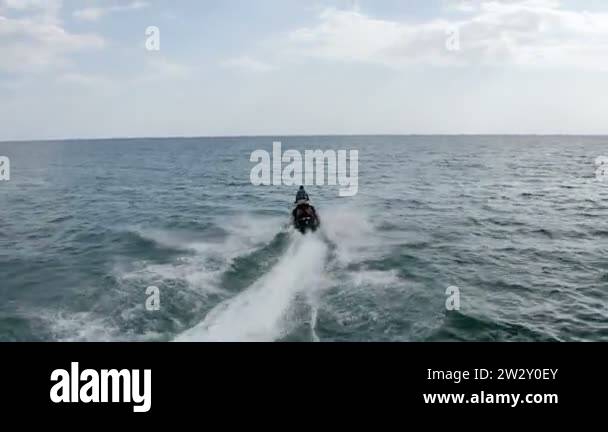 Young guy rides boat Stock Videos & Footage - HD and 4K Video Clips - Alamy