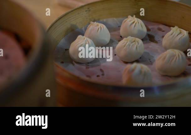 4K Cooking Traditional food. Asian Chef Prepare Fresh Dumplings in the ...