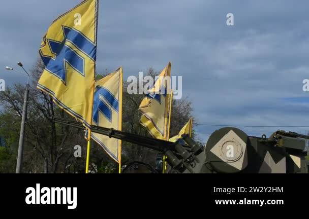 Flags of the regiment "Azov" by military vehicles. Public exhibition of ...