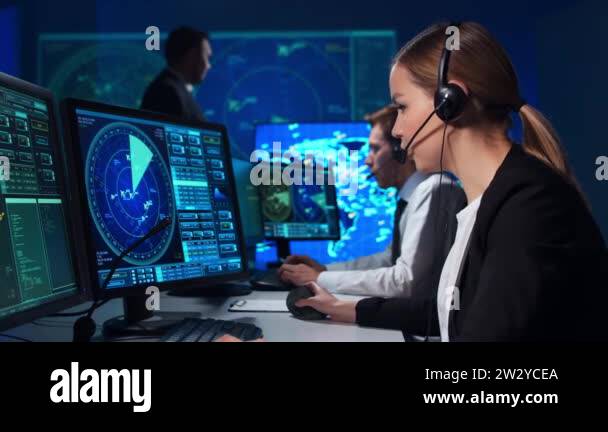 Workplace of the air traffic controllers in the control tower. Team of ...