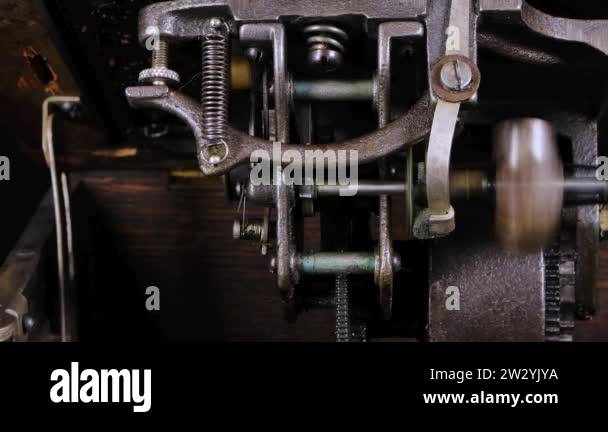 Macro detailed shot of the internal mechanisms of a classic phonograph ...