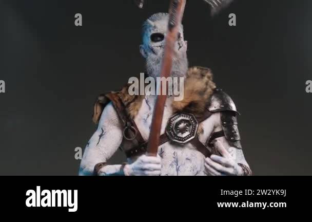 Eternal king of the dead puts two handed axe on his shoulder Stock ...