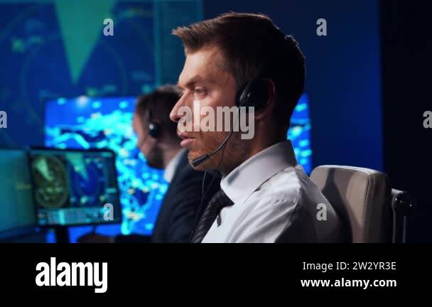 Workplace of the air traffic controllers in the control tower. Team of ...