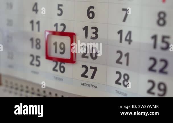 Business man finger pushing red marker on calendar page. Finger pushing ...