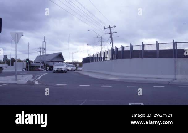 Cars merging into the main road traffic at the junction in Melbourne ...