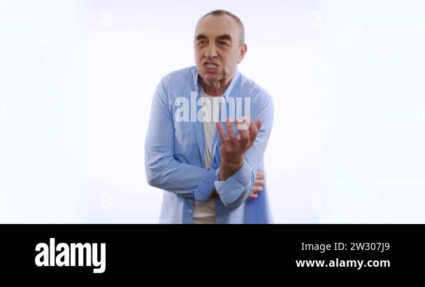 Shocked old expressive man gets angry isolated on white background ...