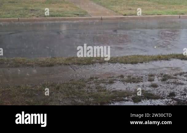 Rain puddle city Stock Videos & Footage - HD and 4K Video Clips - Alamy