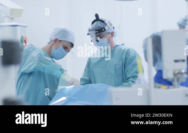 Operation of removing tonsils, tonsillectomy. In modern clinic under ...