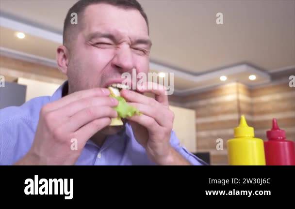 Man eating mouth full Stock Videos & Footage - HD and 4K Video Clips ...