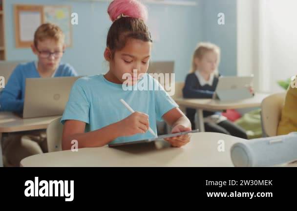 Elementary School Computer Science Class: Smart Boy Uses Laptop ...