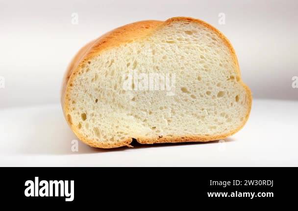 White loaf close-up spinning on a white background. Turntable ...
