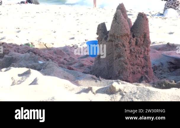 Backlit by sand and towers on the sea beach summer vacation. Sand ...