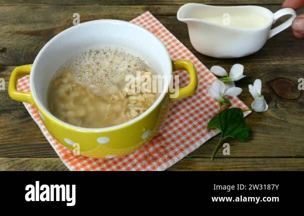 Portion boiled oatmeal porridge Stock Videos & Footage - HD and 4K ...