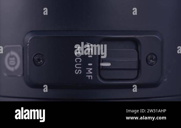 Extreme close up of camera lens details. Action. Manual MF and auto AF ...