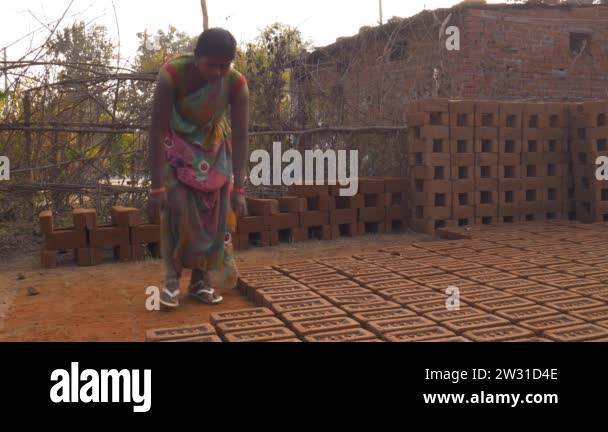 Indian woman manual labor Stock Videos & Footage - HD and 4K Video ...