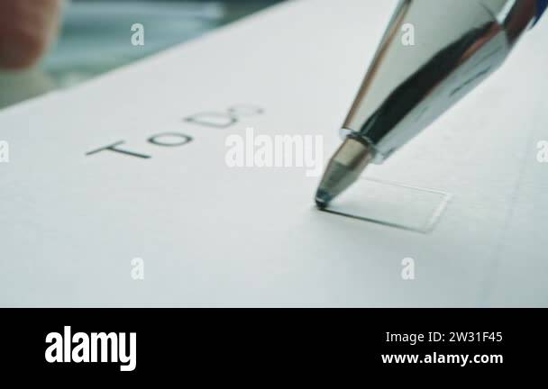 Person Ticks Checkbox Marks with a Pen, filling up To Do List. Checking ...