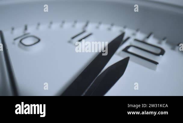 Extreme macro wide angle close up as the second hand ticks past the 12 ...