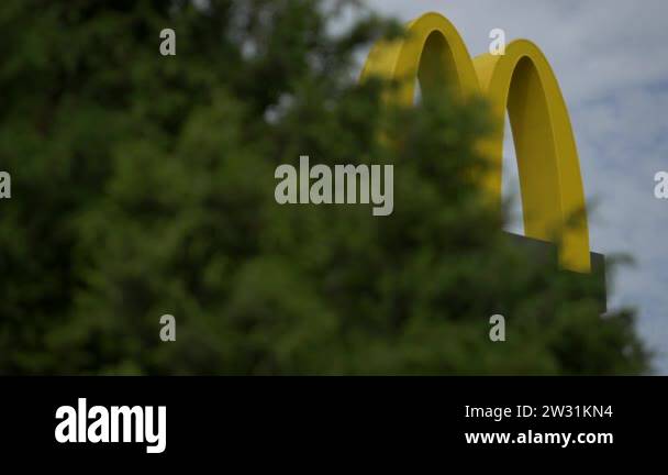 McDonalds logo. Fast-food restaurant outdoor advertising of yellow sign ...