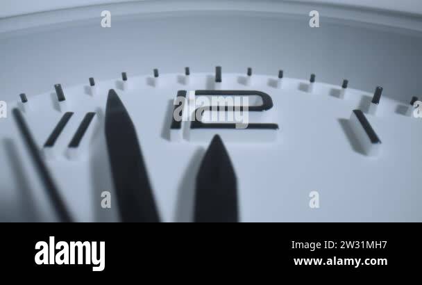 Extreme macro wide angle close up as the second hand ticks past the 12 ...