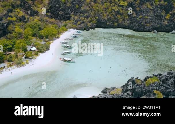 taking rest in noon on star beach on tapiutan island near matinloc ...