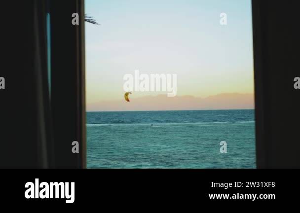 People Kite surfing in beautiful clear water in Dahab Egypt point of ...