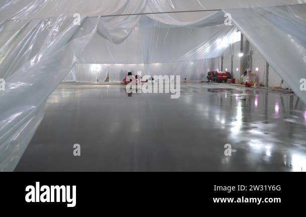 Grinding concrete pavement, Power trowel machine at construction site ...