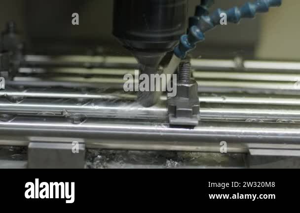 CNC milling machine drills holes in the pipe Stock Video Footage - Alamy