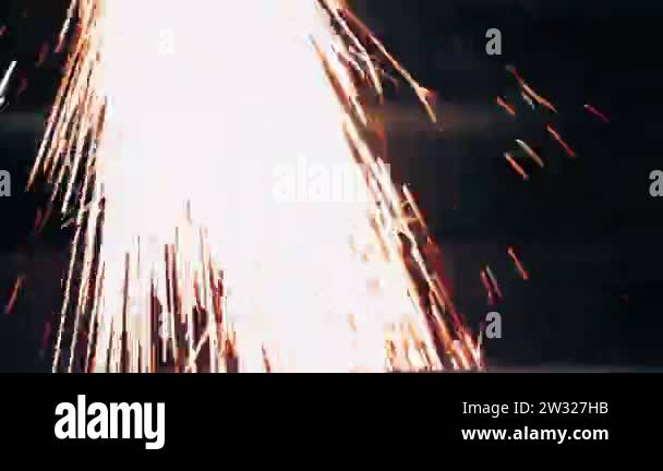 Laser cutting machine for sheet metal. close-up. bright burning sparks ...