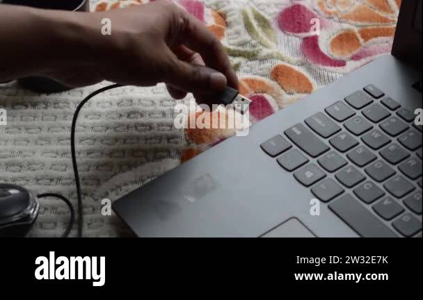 Human hand connecting Computer mouse connection cable plug-in the ...