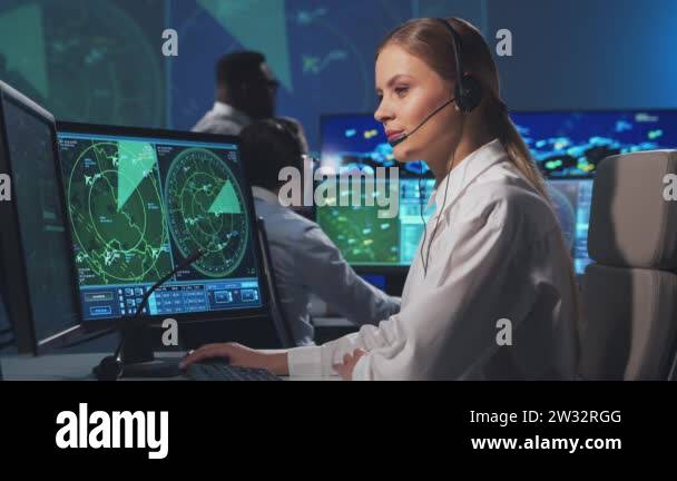 Workplace of the air traffic controllers in the control tower. Diverse ...