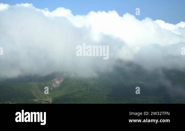 4K Aerial view of Taipei city in a cloudy day with fog from the Beitou ...