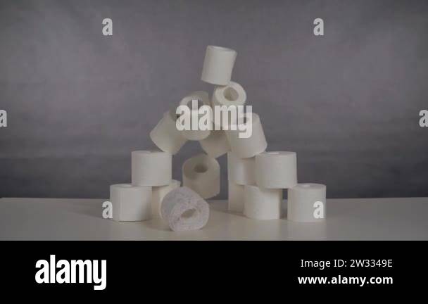 a pyramid of toilet paper destroys a roll of toilet paper Stock Video ...