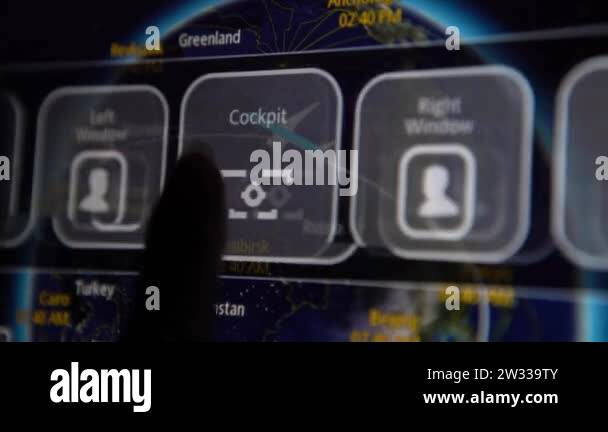 , -05 December, 2016: 4K Close up of woman using touchscreen flight ...