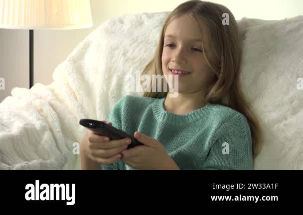 Kid Watching TV, Child with Remote Control Relaxing on Sofa, Blonde ...