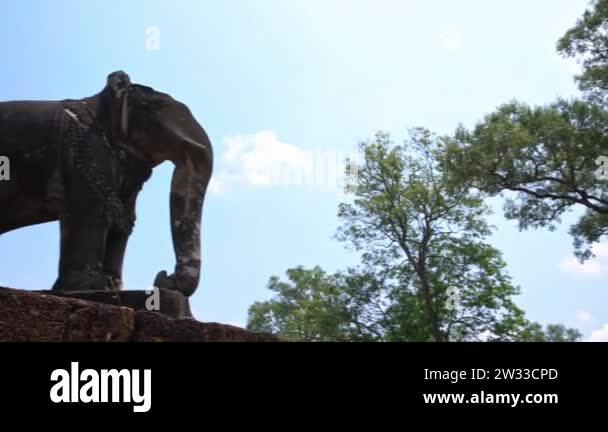 4K, East Mebon guardian elephant. Elephant sculpture at ancient temple ...