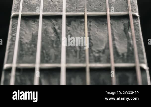 Neck of a acoustic guitar. Details of the worn out wooden neck guitar ...