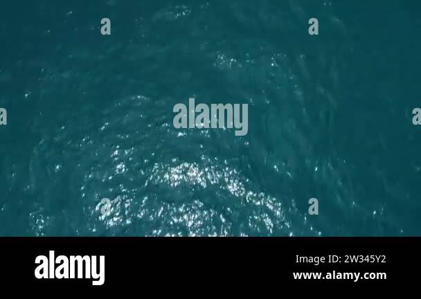Aerial view Drone video ripples and wave in open sea,top view texture ...