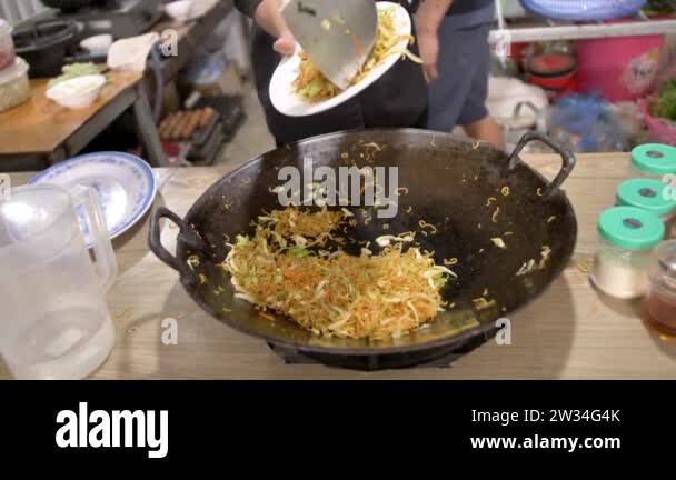 Chef preparing traditional food in Vietnam. Local restaurant in ...